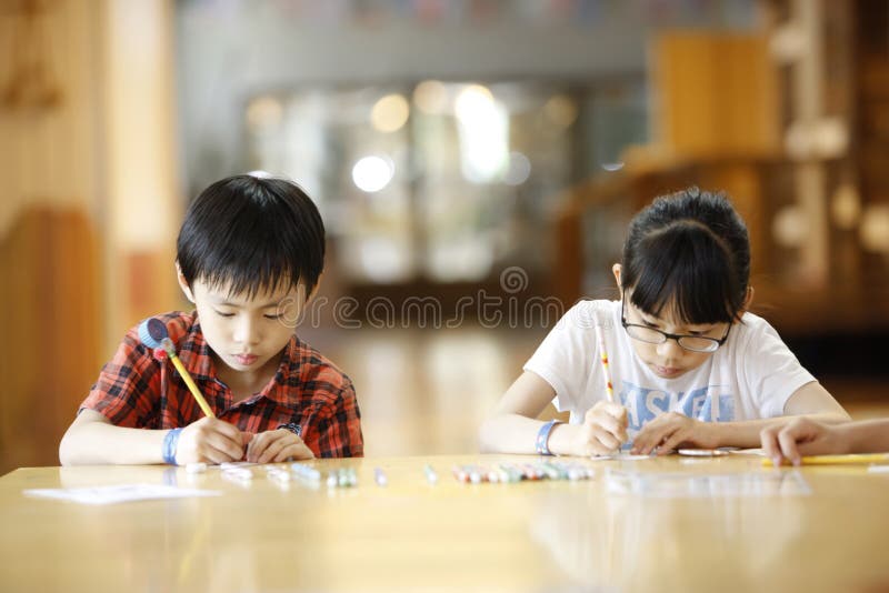 Young Students Concentrating in Creative Education Class Stock Photo ...