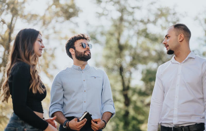 Young Students Discussing, Collaborating, and Solving Problems Together ...