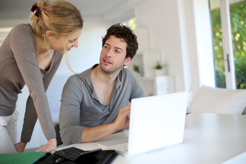 Young Students at Home Studying on Laptop Stock Image - Image of home ...