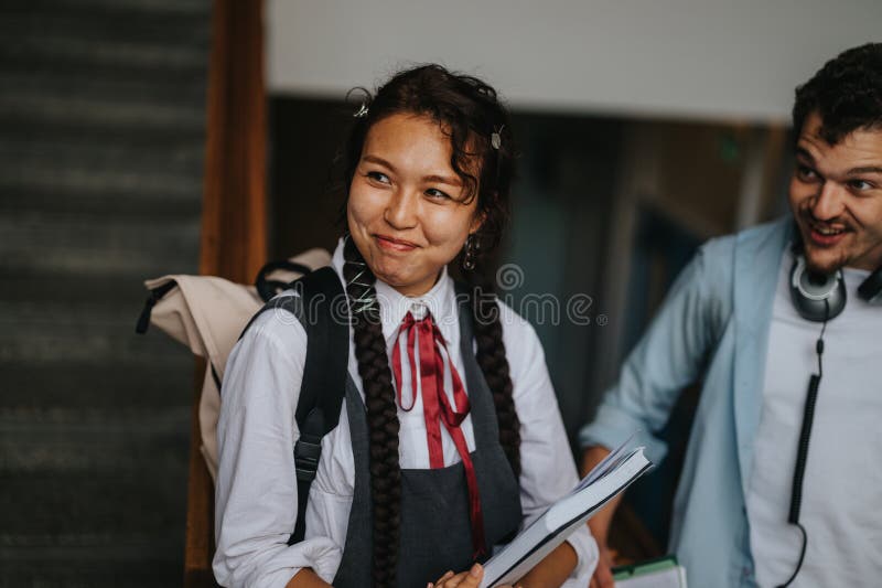Young Students Interacting with Professor in Casual Outdoor Setting ...
