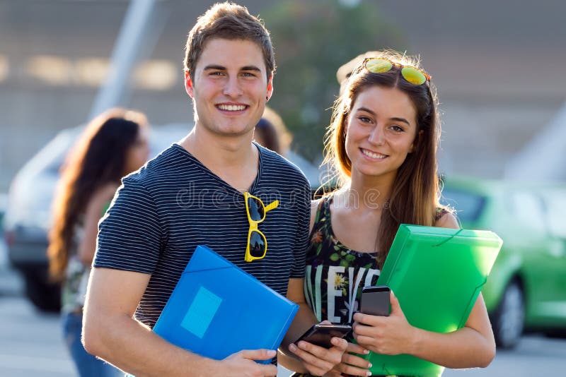Young Students Looking at the Camera after Class. Stock Photo - Image ...