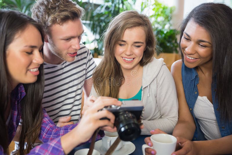 Young Students Looking at a Camera Stock Photo - Image of acade ...