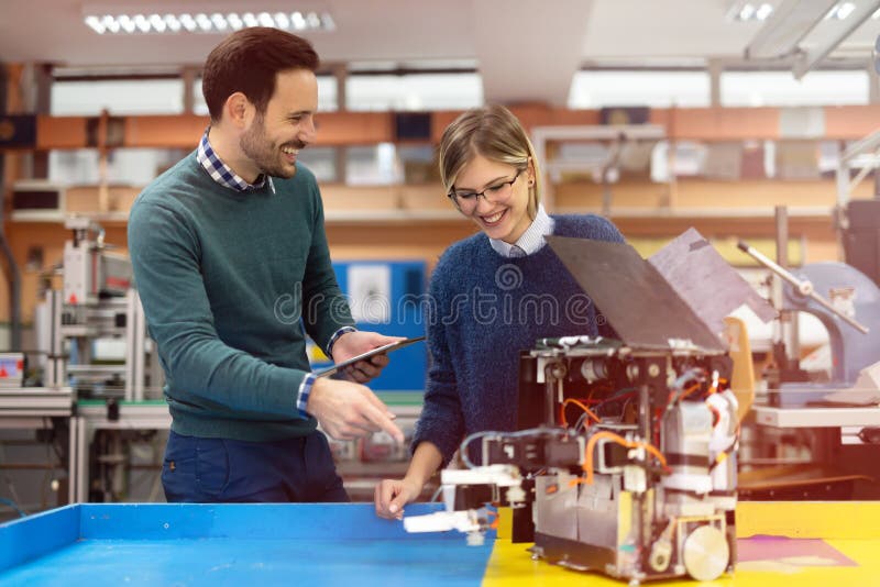 Young Students of Robotics Preparing Robot for Testing Stock Image ...