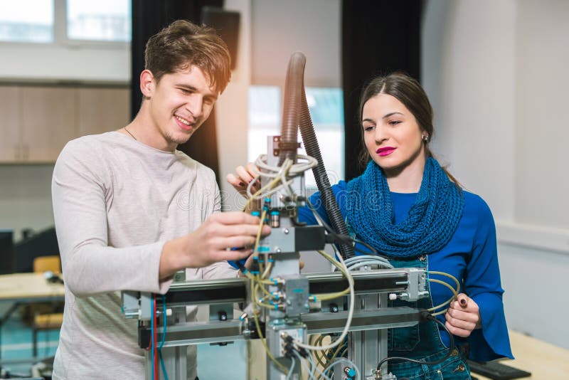 Students of Robotics Preparing Robot for Testing in Worksh Stock Photo ... Students of Robotics Preparing Robot for Testing in Worksh Stock Photo ...