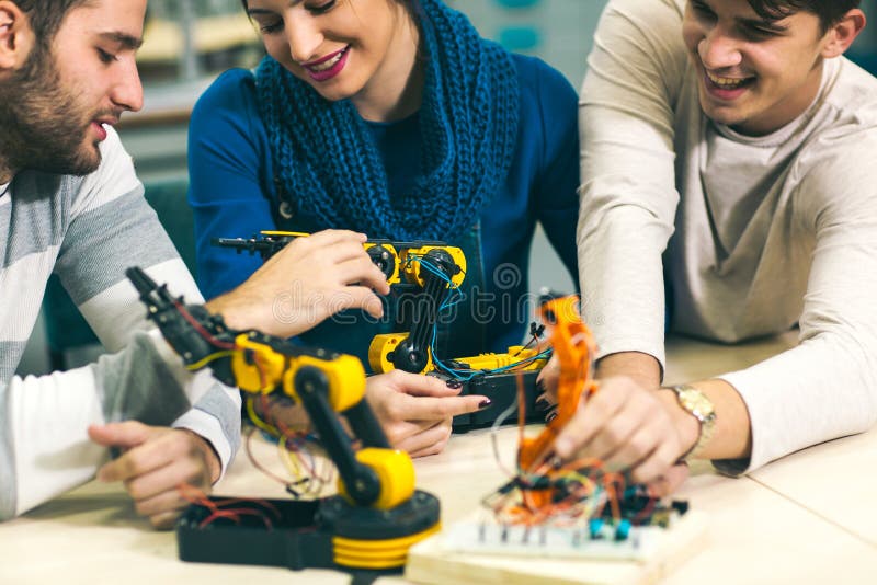 Students of Robotics Preparing Robot for Testing in Workshop Stock ...