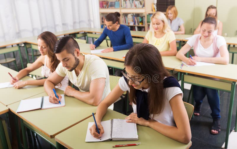 Young Students Studying in the Classroom Stock Image - Image of ...