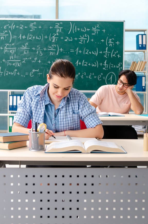 Young Students Taking the Math Exam in Classroom Stock Image - Image of ...