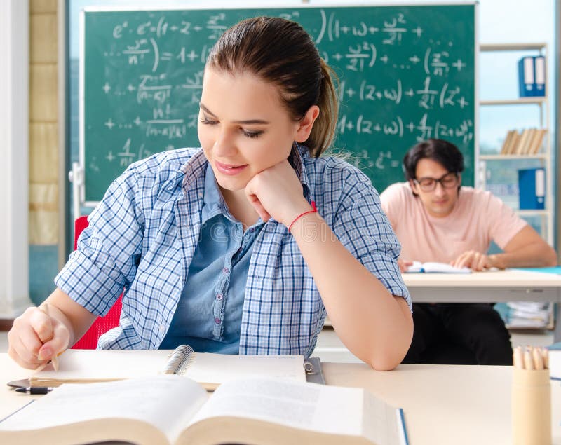 Young Students Taking the Math Exam in Classroom Stock Photo - Image of ...