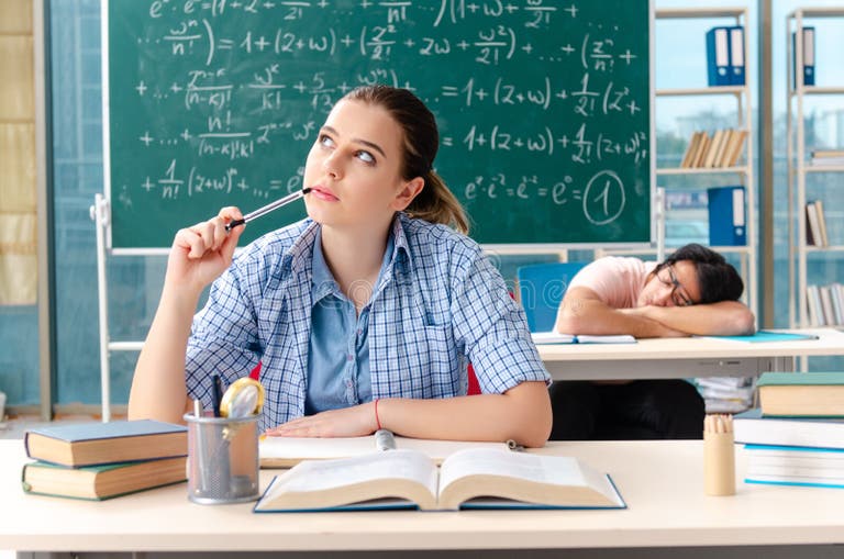 The Young Students Taking the Math Exam in Classroom Stock Image ...