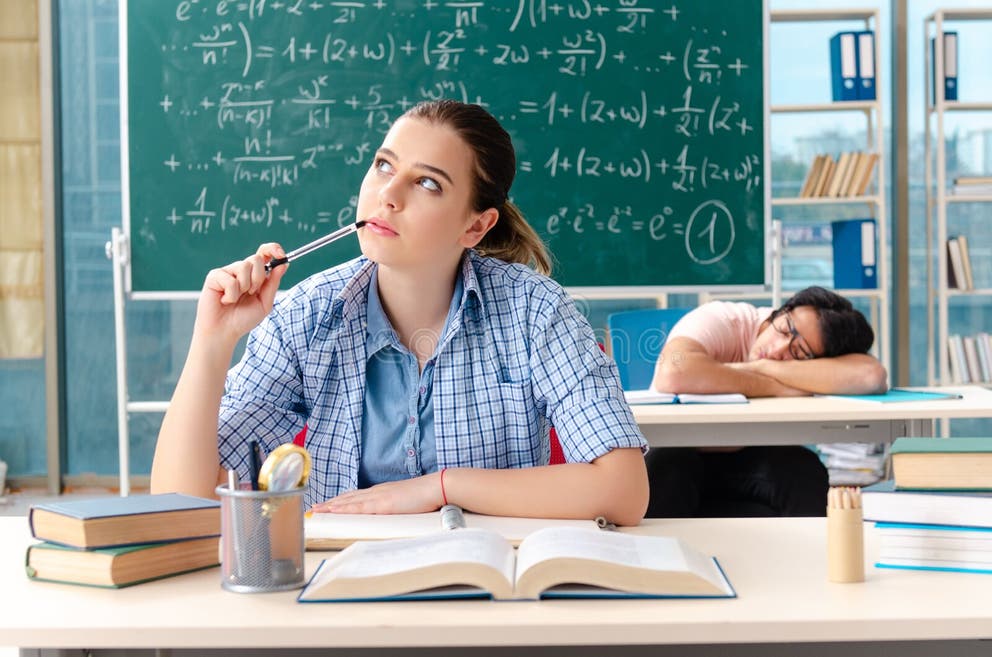 The Young Students Taking the Math Exam in Classroom Stock Image ...
