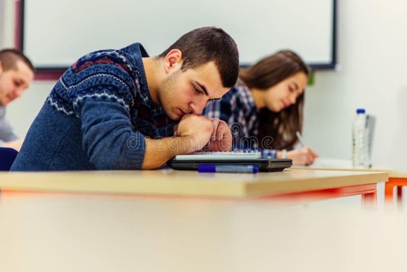 Students on exam at school stock image. Image of caucasian - 145321793