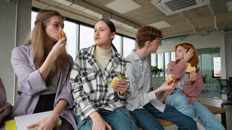 Young Students are on Their Lunch Break after Classes. they are in ...