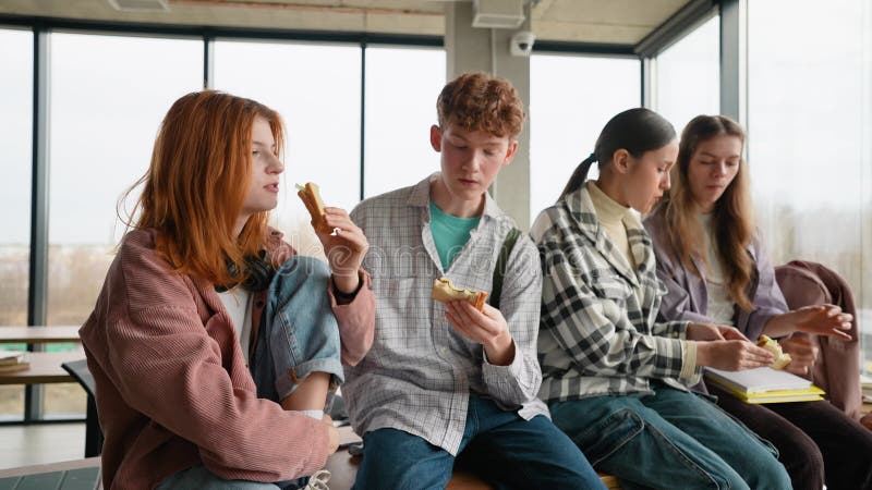 Young Students are on Their Lunch Break after Classes. they are in ...