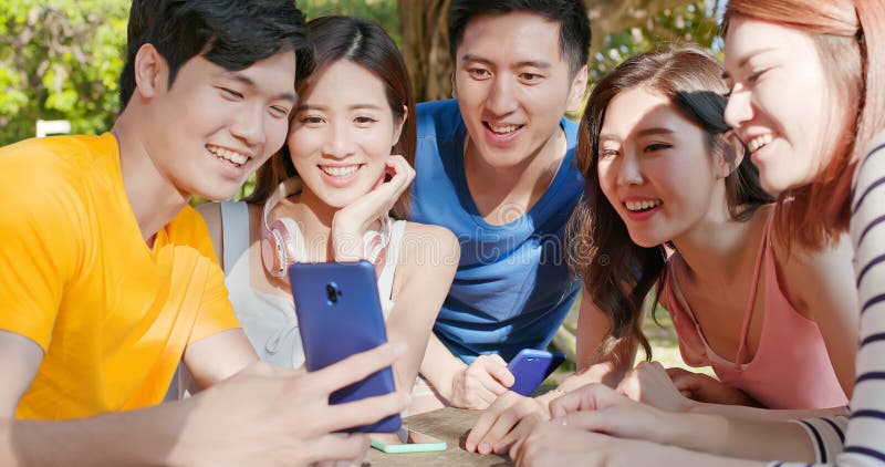 Young Students Use Smartphone Stock Image - Image of female, college ...