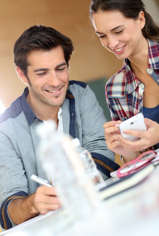 Young Students Using Smartphones Stock Image - Image of european ...