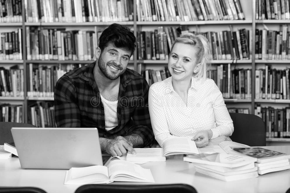 Young Students Using Their Laptop in a Library Stock Photo - Image of ...