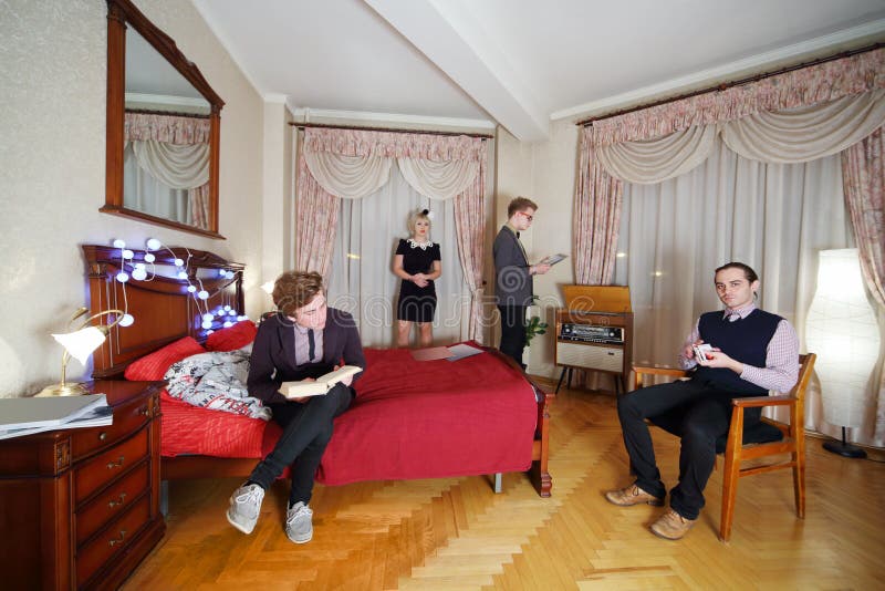 Young Stylish and Beautiful People in Retro Room Stock Photo - Image of ...