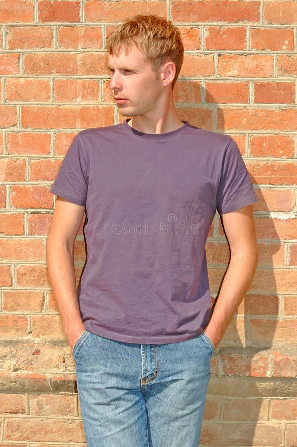 Young Stylish Man Stand Near Brick Wall. Stock Image - Image of ...