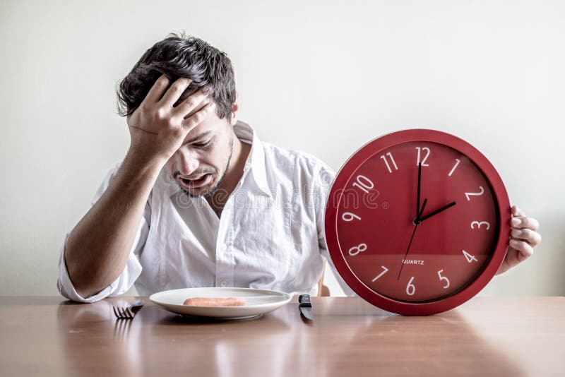 Young Stylish Man with White Shirt Holding Red Clock Stock Photo ...