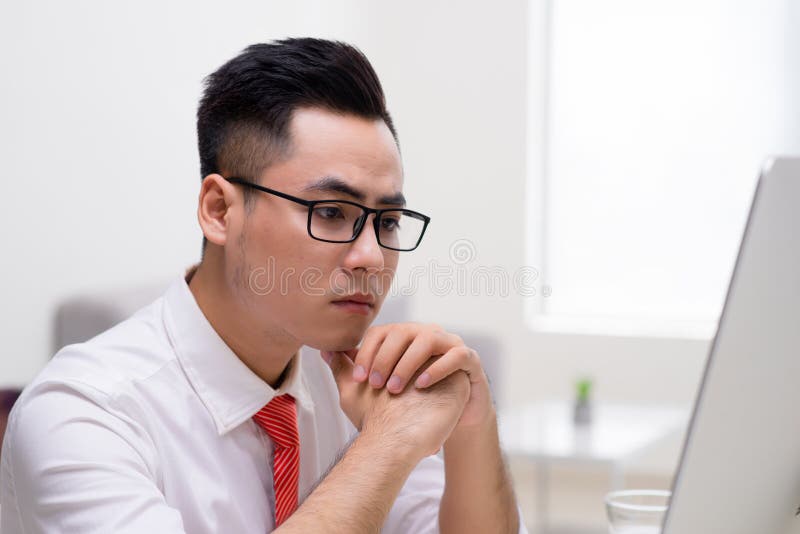 Young Stylish Worker at Office Working with Computer and Thinking How ...