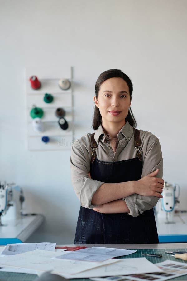 Young Successful Female Tanner in Workwear Standing by Workplace in ...