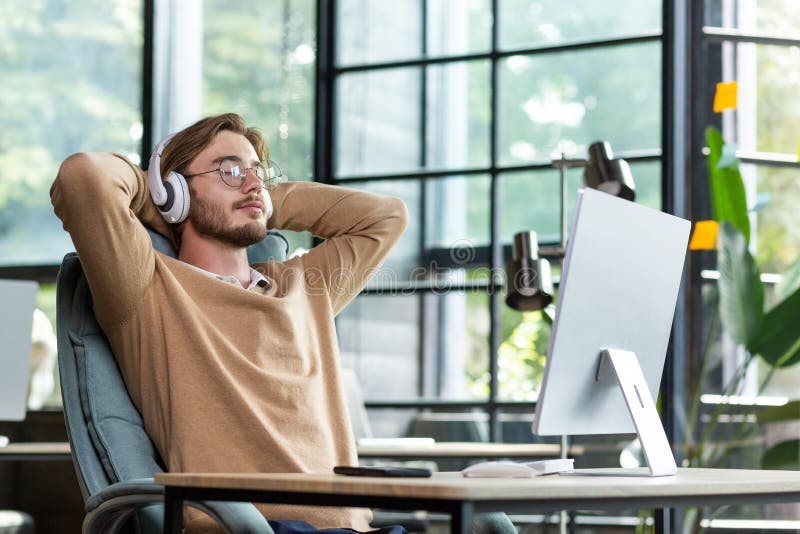 Young Successful Man in Office Resting with Eyes Closed and Hands ...
