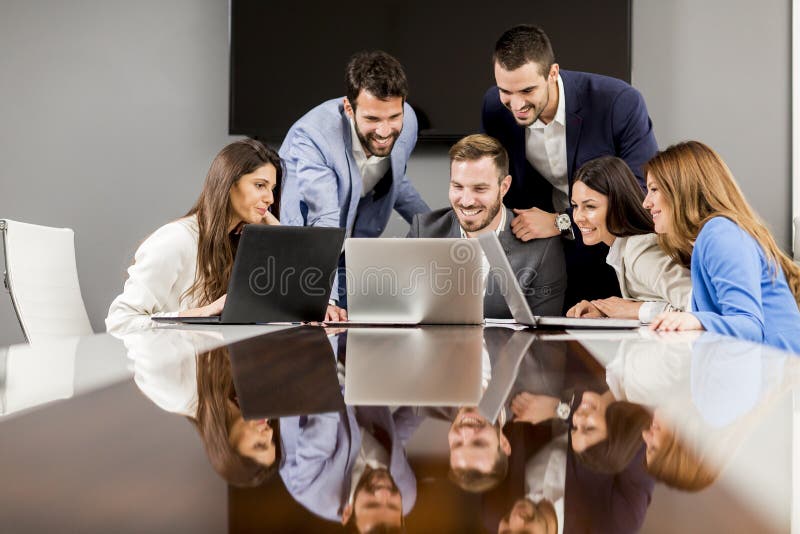 Young Successful Managers Discussing New Business Project Stock Photo ...