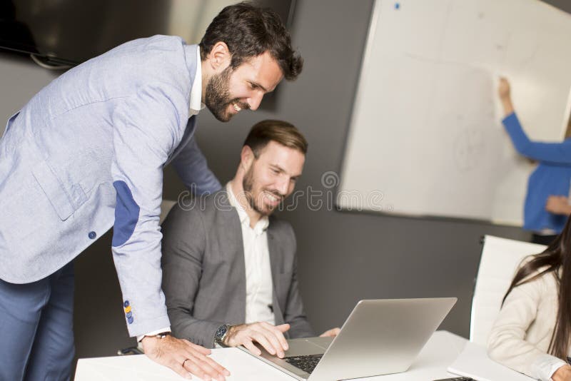Young Successful Managers Discussing New Business Project Stock Image ...