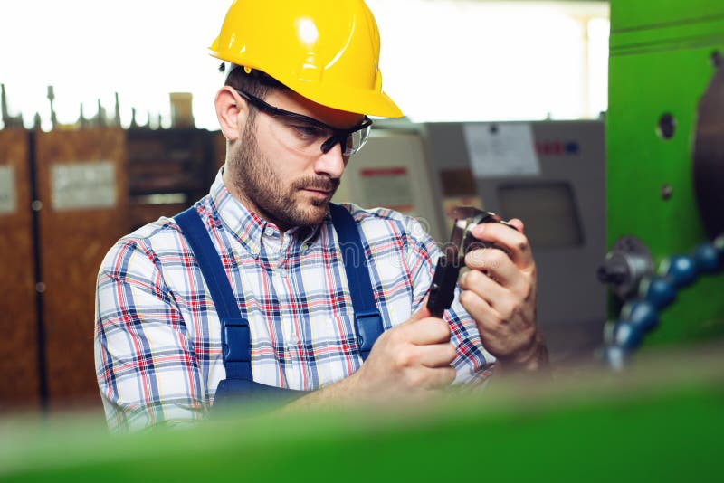 Supervisor Doing Quality Control and Production Check in Factory Stock ...