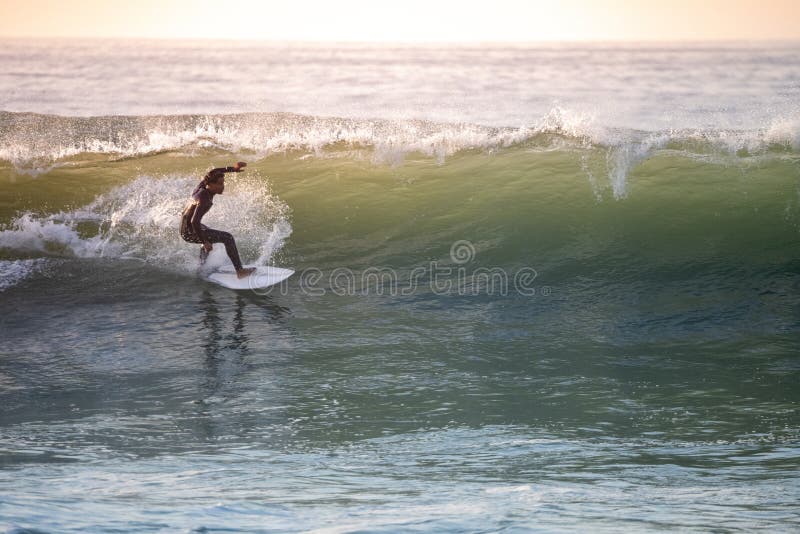 Young Surfer Enjoying Waves Stock Photo - Image of outdoor, blue: 303666542