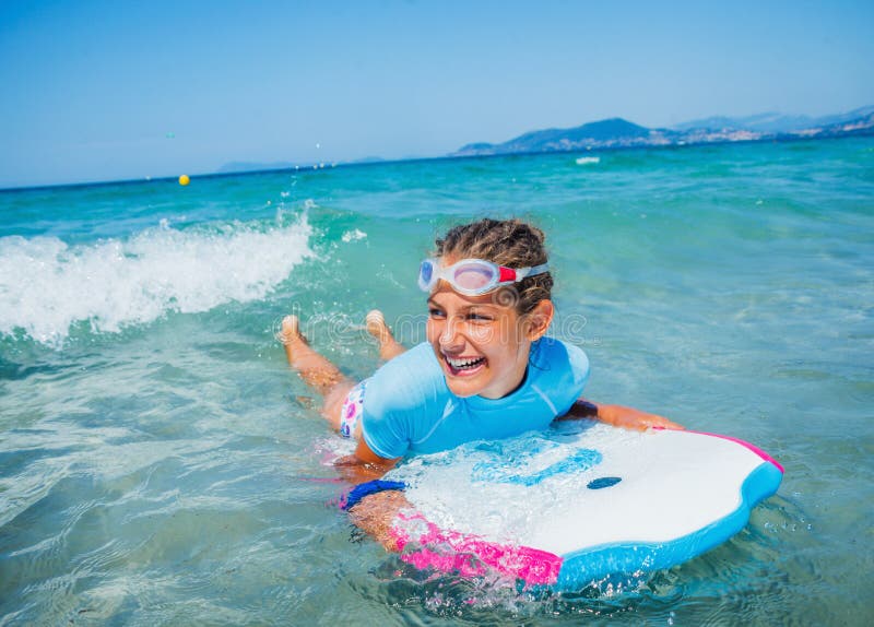 Young surfer girl stock photo. Image of health, child - 71172226