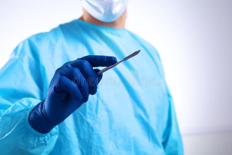 Young Surgeon Holding a Scalpel. Ready for Operation Stock Image ...