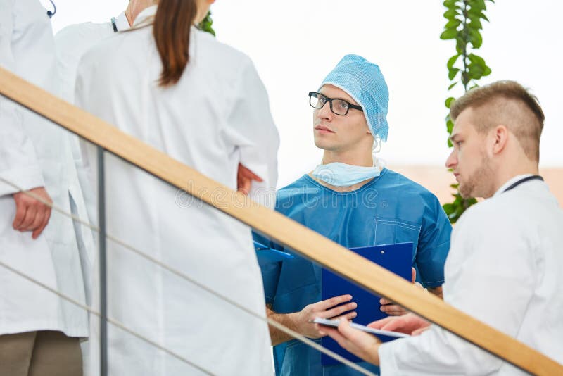 Young surgeon plan surgery stock photo. Image of cooperation - 116204872