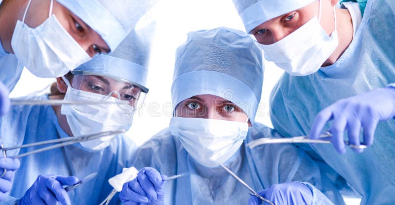 Young Surgery Team in the Operating Room Stock Photo - Image of people ...