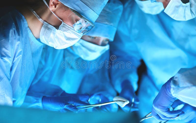 Young Surgery Team in the Operating Room Stock Photo - Image of ...