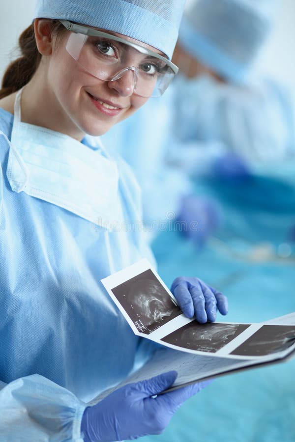 Young Surgery Team in the Operating Room Stock Photo - Image of patient ...