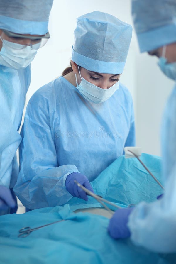 Young Surgery Team in the Operating Room Stock Photo - Image of ...