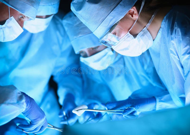 Young Surgery Team in the Operating Room Stock Image - Image of ...