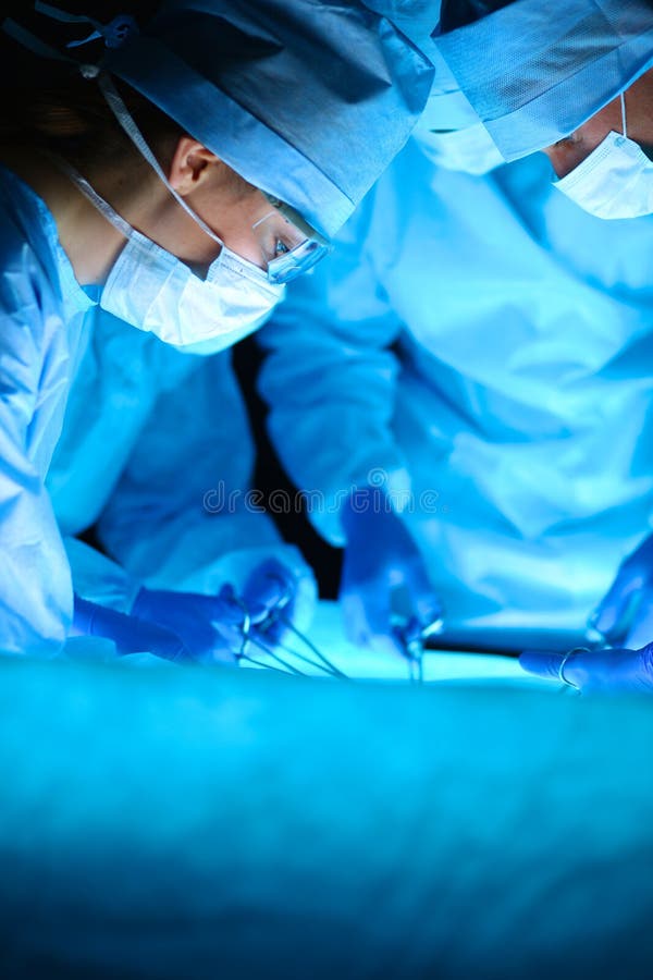 Young Surgery Team in the Operating Room Stock Photo - Image of staff ...