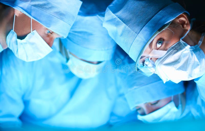 Young Surgery Team in the Operating Room Stock Photo - Image of doctor ...