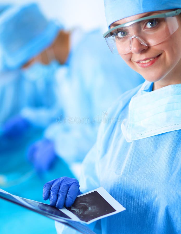 Young Surgery Team in the Operating Room Stock Image - Image of ...