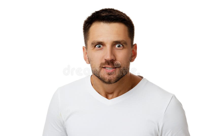 Surprised Handsome Bearded Man With Shocked Facial Expression Stock