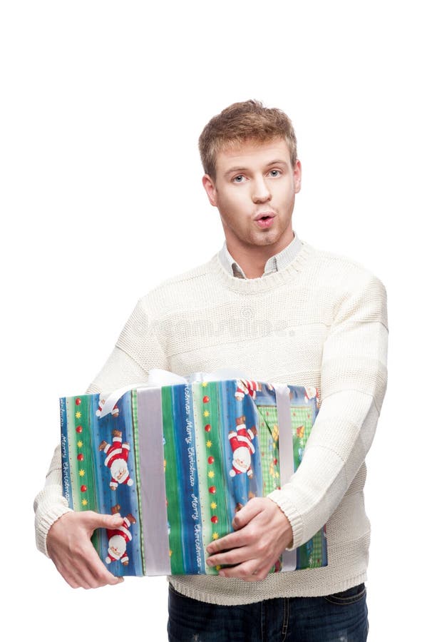 Young Surprised Man Holding Big Heavy Gift Stock Photo - Image of ...