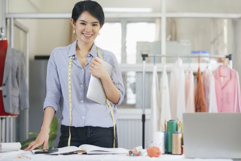Young tailor design owner. stock photo. Image of business - 183320432