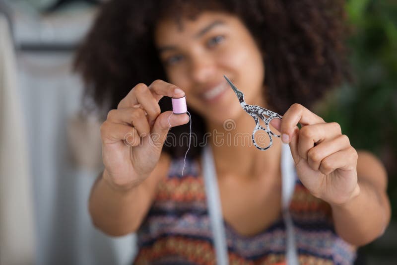 Young Tailor Showing Scissors and Thread Stock Image - Image of tailor ...