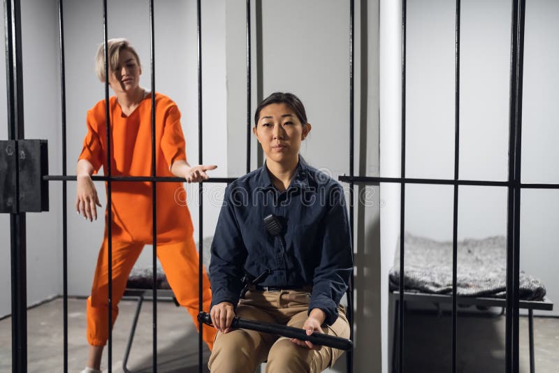 Blonde Inmate in an Asian Women`s General Security Prison is Led Out of ...