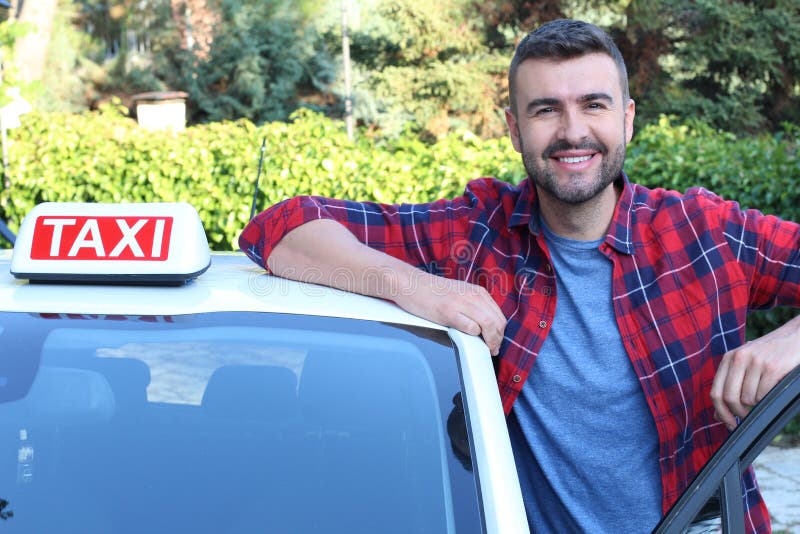 Young taxi driver at work stock photo. Image of european - 217818420
