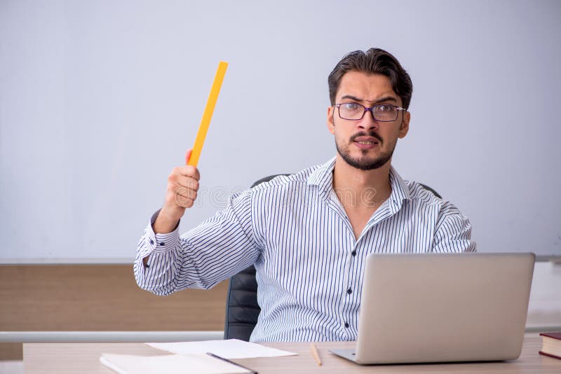 Angry Teacher Holding Ruler Stock Photos - Free & Royalty-Free Stock ...