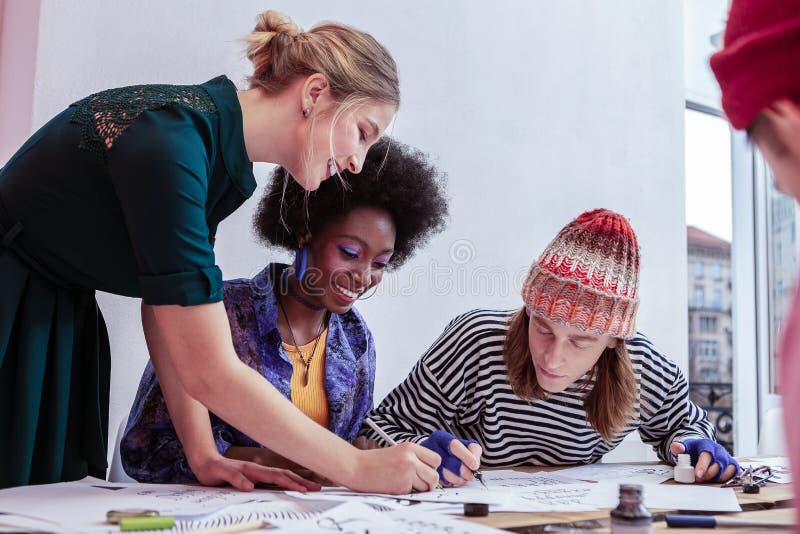 Young Teacher Feeling Good while Interacting with Her Students Stock ...