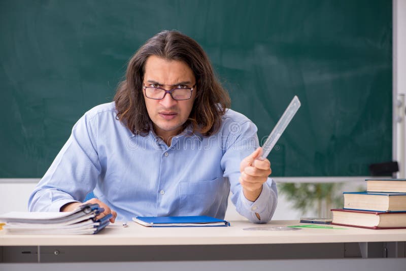 Angry Teacher Holding Ruler Stock Photos - Free & Royalty-Free Stock ...